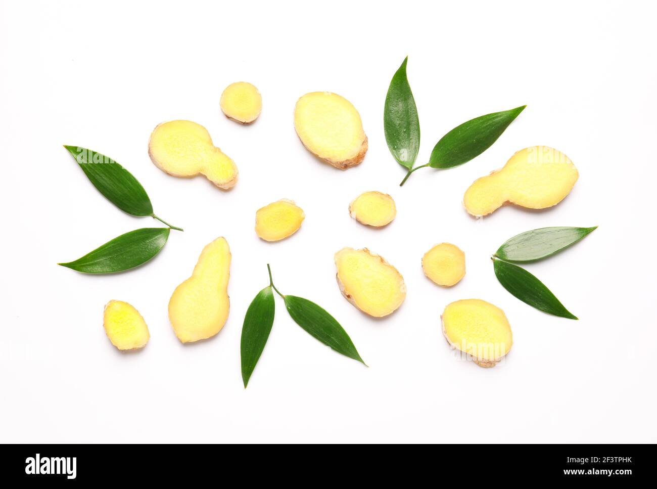 Fresh cut ginger on white background Stock Photo - Alamy