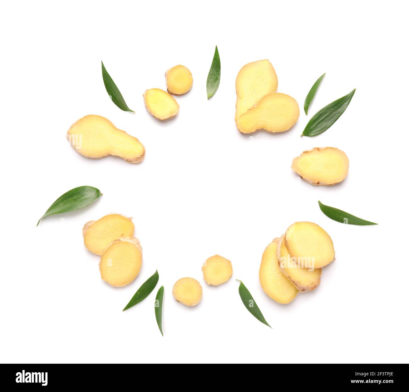 Fresh cut ginger on white background Stock Photo - Alamy