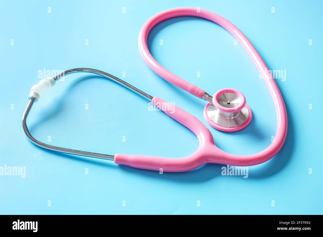Modern stethoscope on color background Stock Photo - Alamy