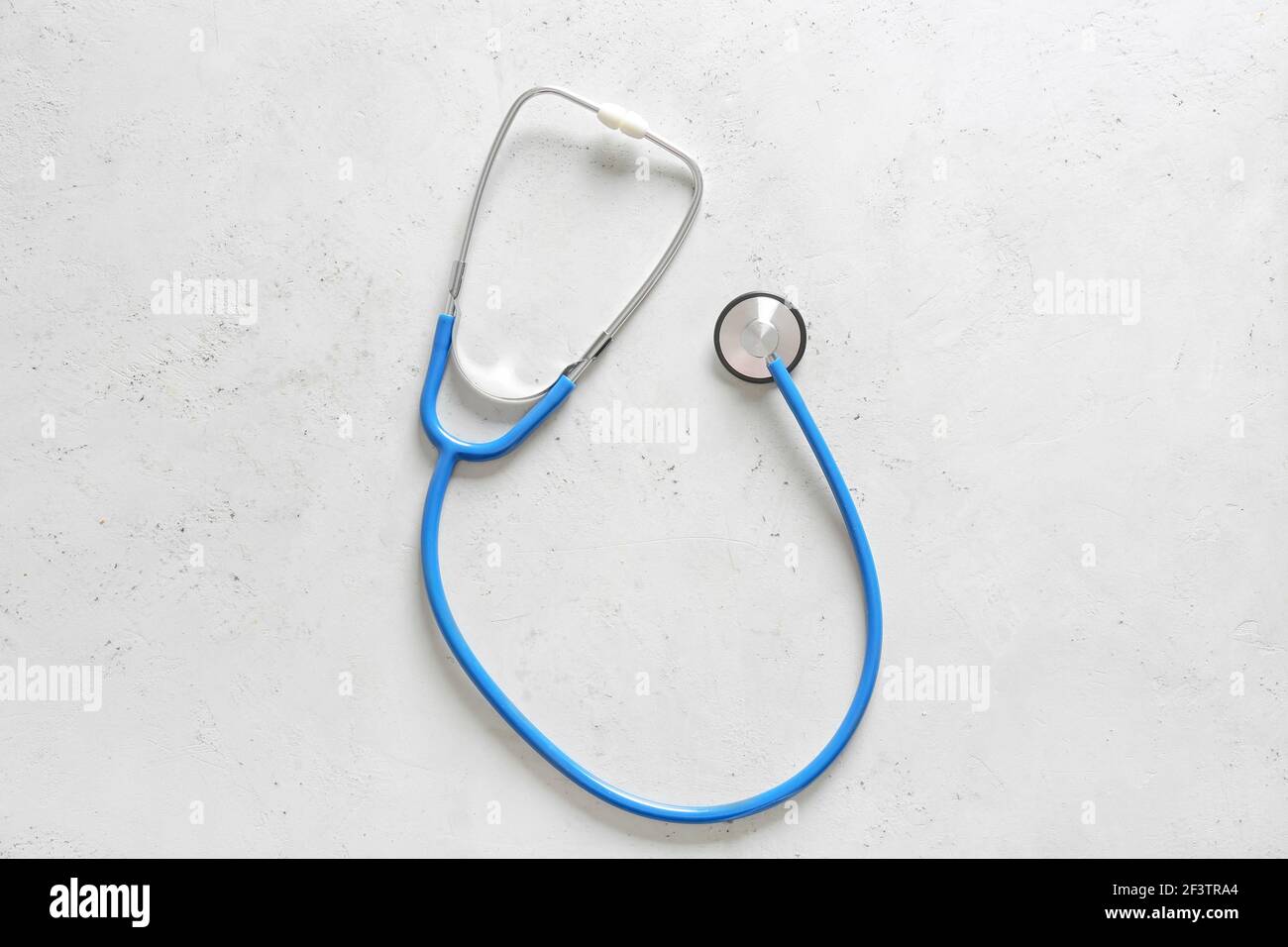 Modern stethoscope on light background Stock Photo - Alamy