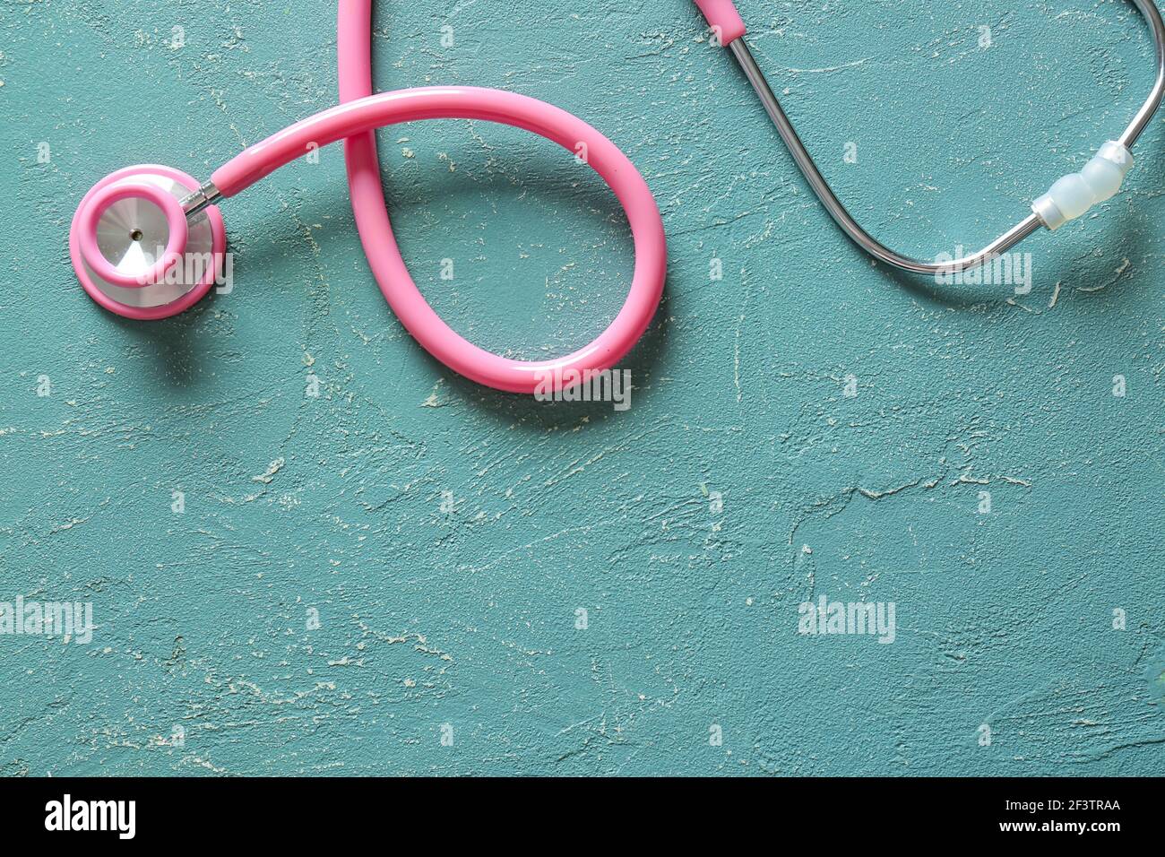 Modern stethoscope on color background Stock Photo - Alamy
