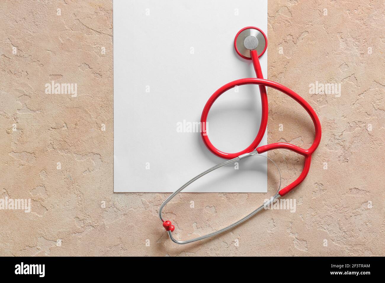 Modern stethoscope and sheet of paper on color background Stock Photo ...