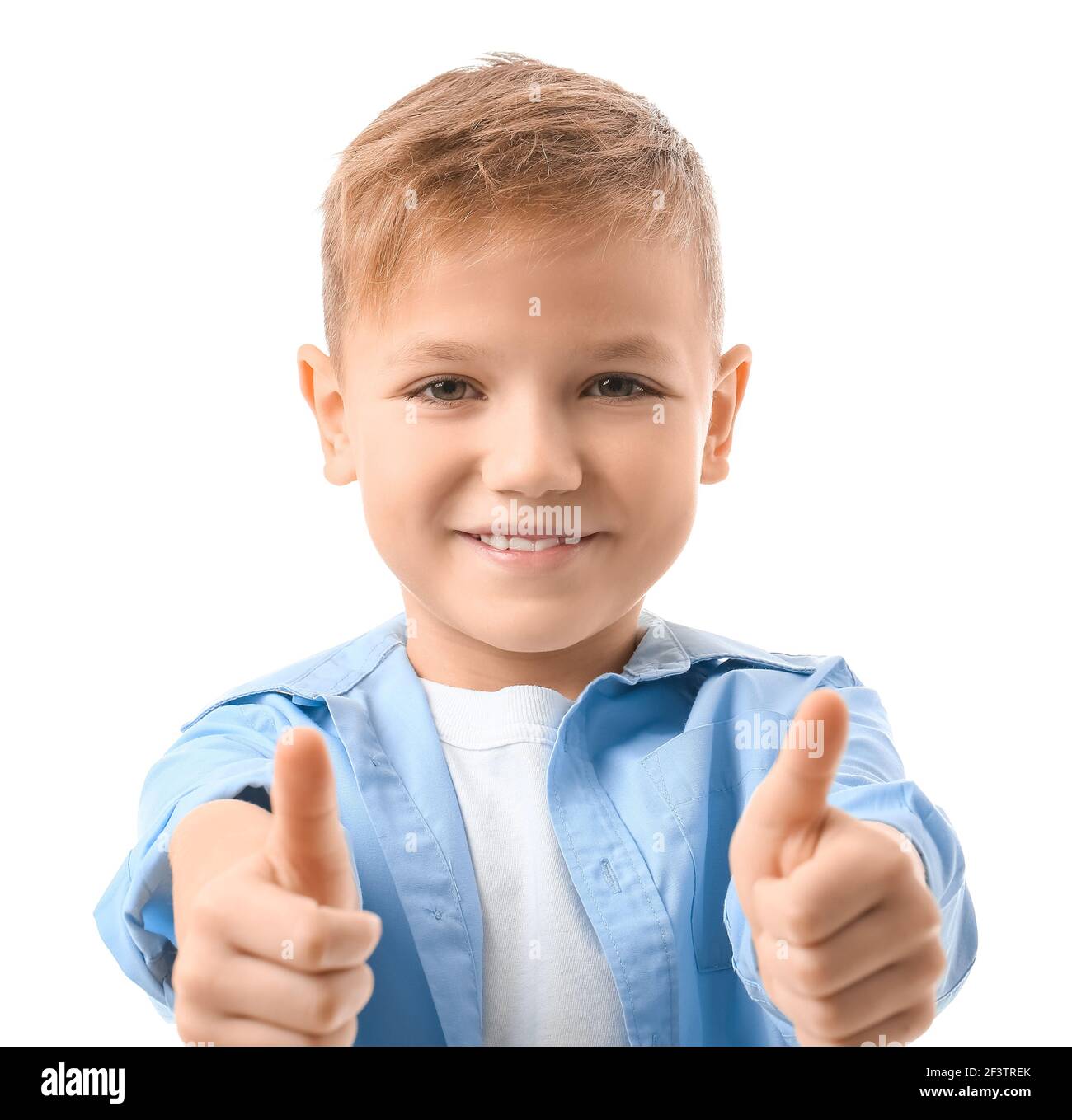 Cute little boy showing thumb-up on white background Stock Photo - Alamy