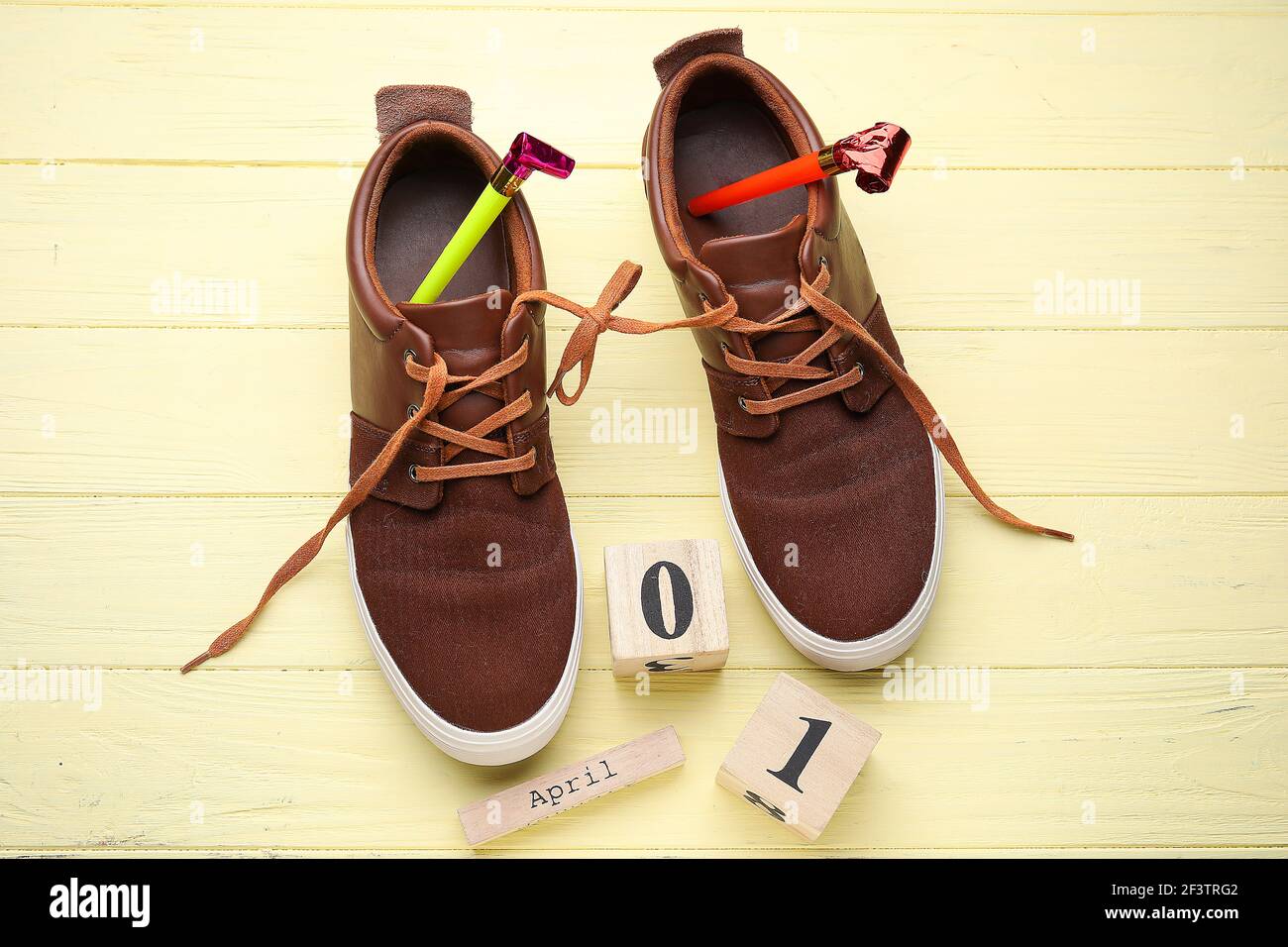 Shoes with tied laces and calendar with date of April Fools Day on ...