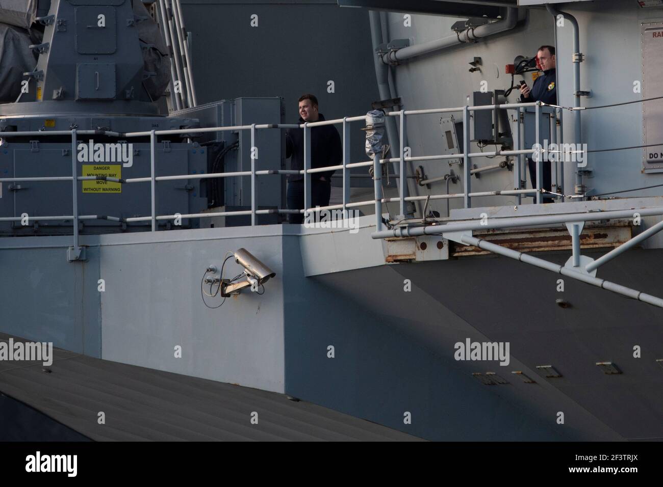 Finnart, Loch Long, Scotland, UK. 17 March 2021. Royal Navy crew member ...