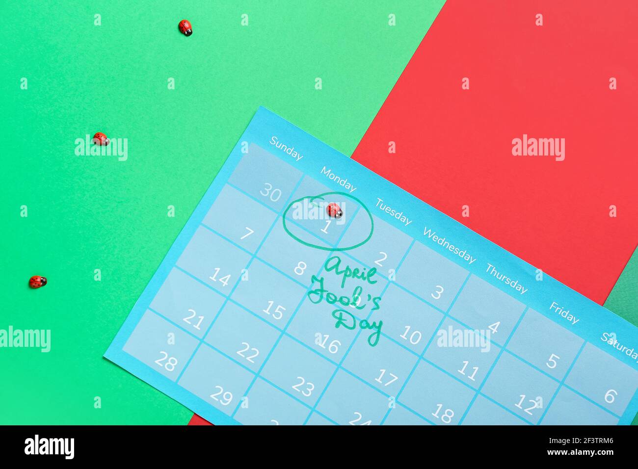 Calendar with marked date of April Fool's Day on color background Stock ...