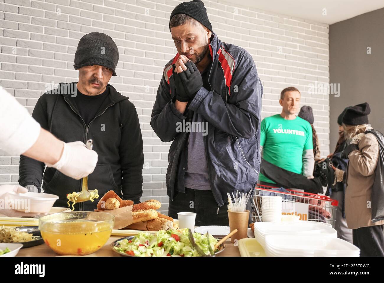 Person Giving Homeless Person Food