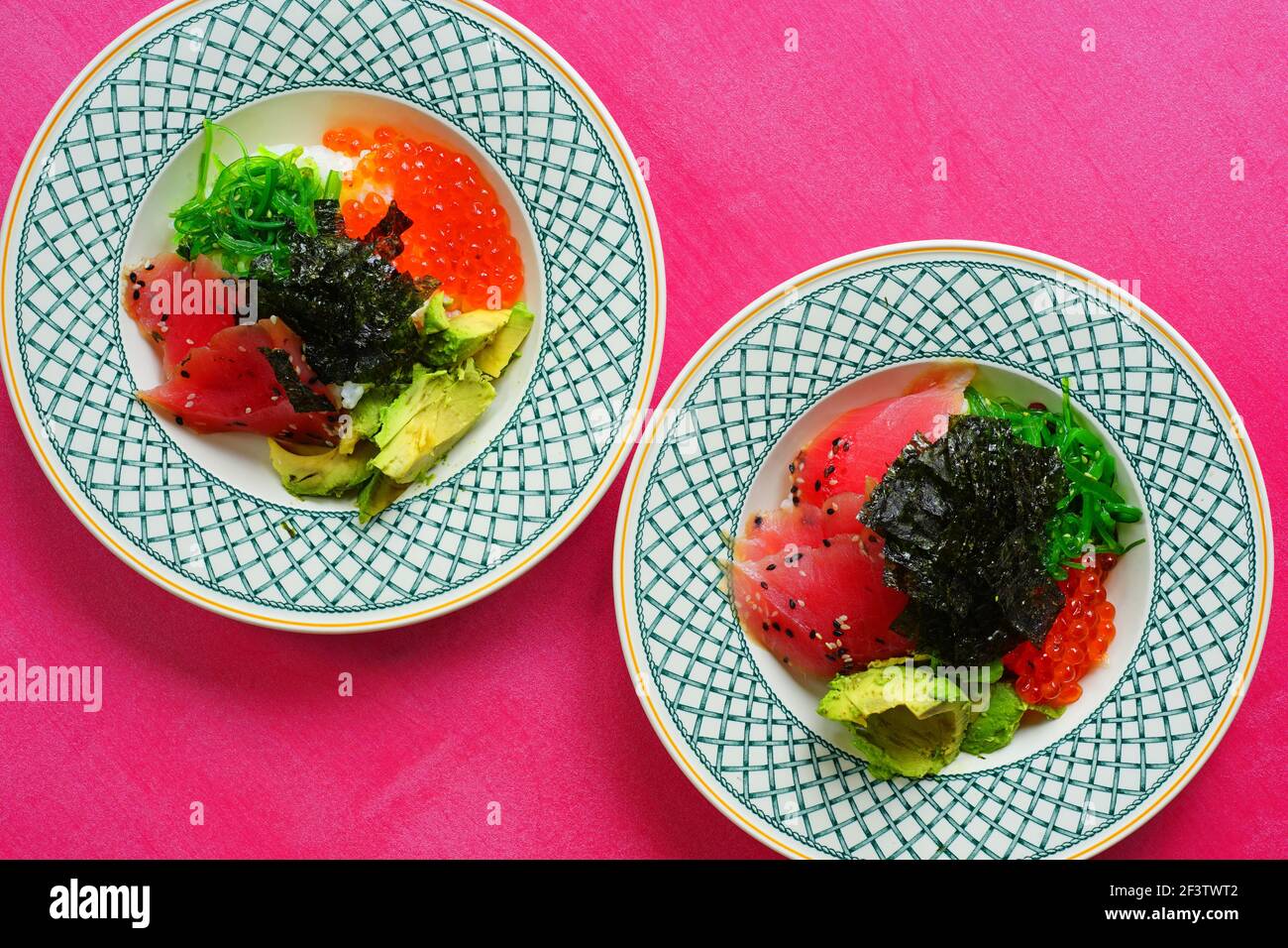 Asian green rice bowl with smoked Ahi tuna slices, salmon roe, cucumber ...