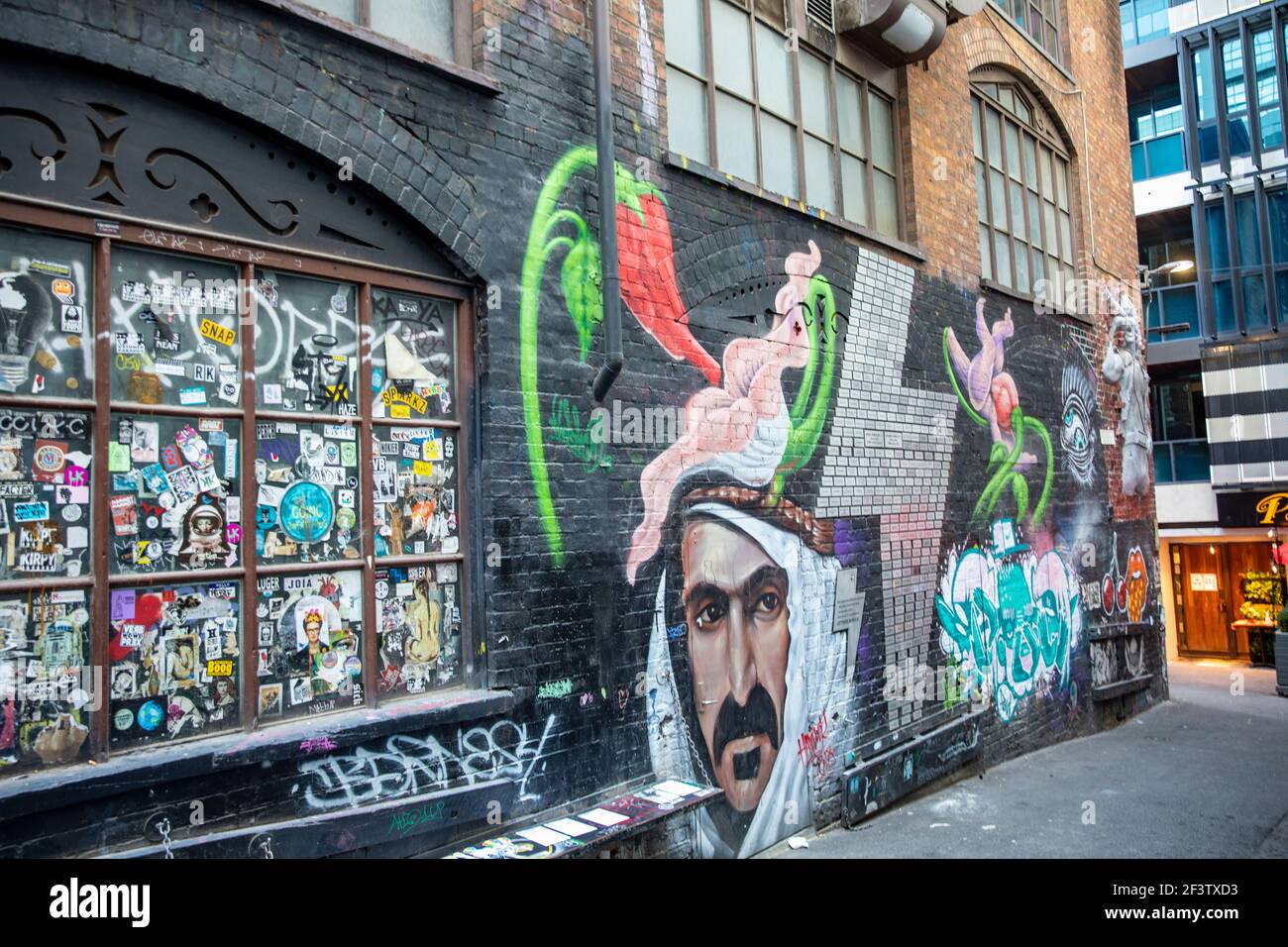 ACDC lane Melbourne city centre with street art and paintings paying ...