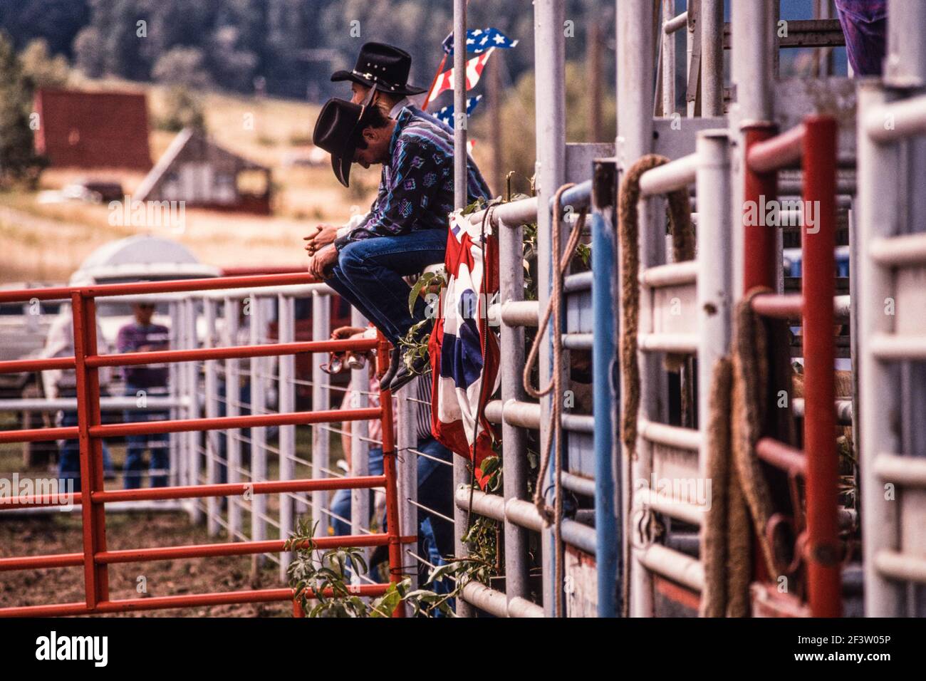 Cowboys on fence hi-res stock photography and images - Alamy