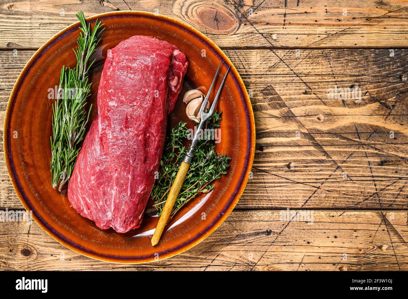 Whole Raw fillet Tenderloin beef meat for steaks. wooden background ...