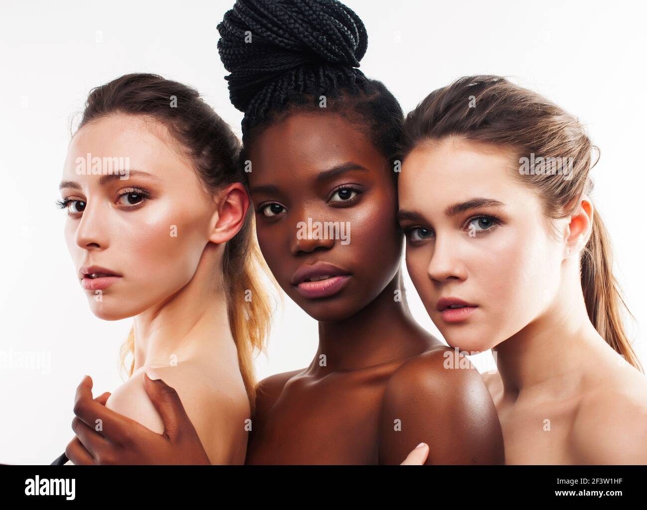 three different nation woman: african-american, caucasian together ...