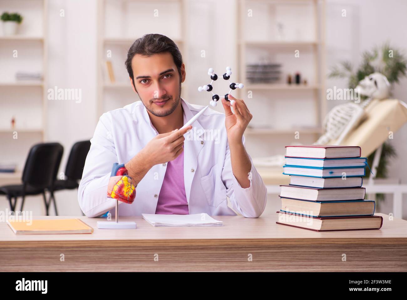 Young doctor student sitting in the classroom Stock Photo - Alamy