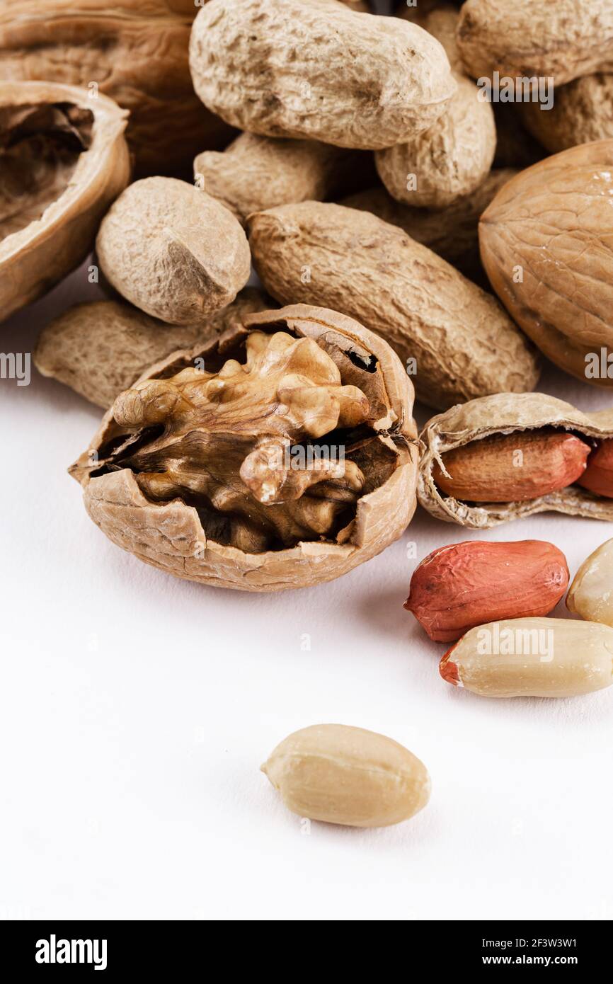 peanuts and walnuts in white background Stock Photo - Alamy