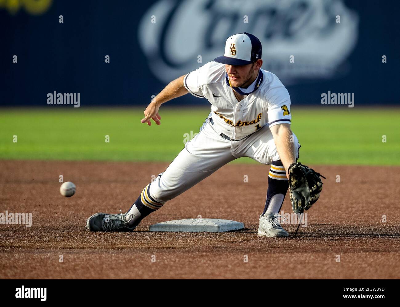 March 16, 2021: Central Oklahoma infielder Colton Bertus fields a ball ...