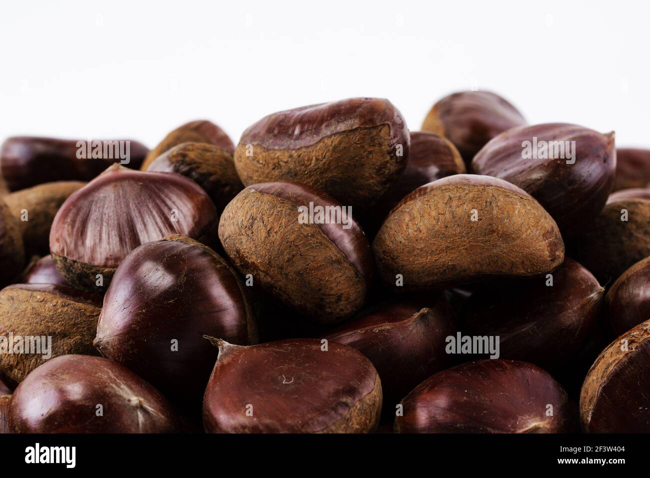 chestnuts in white background Stock Photo - Alamy