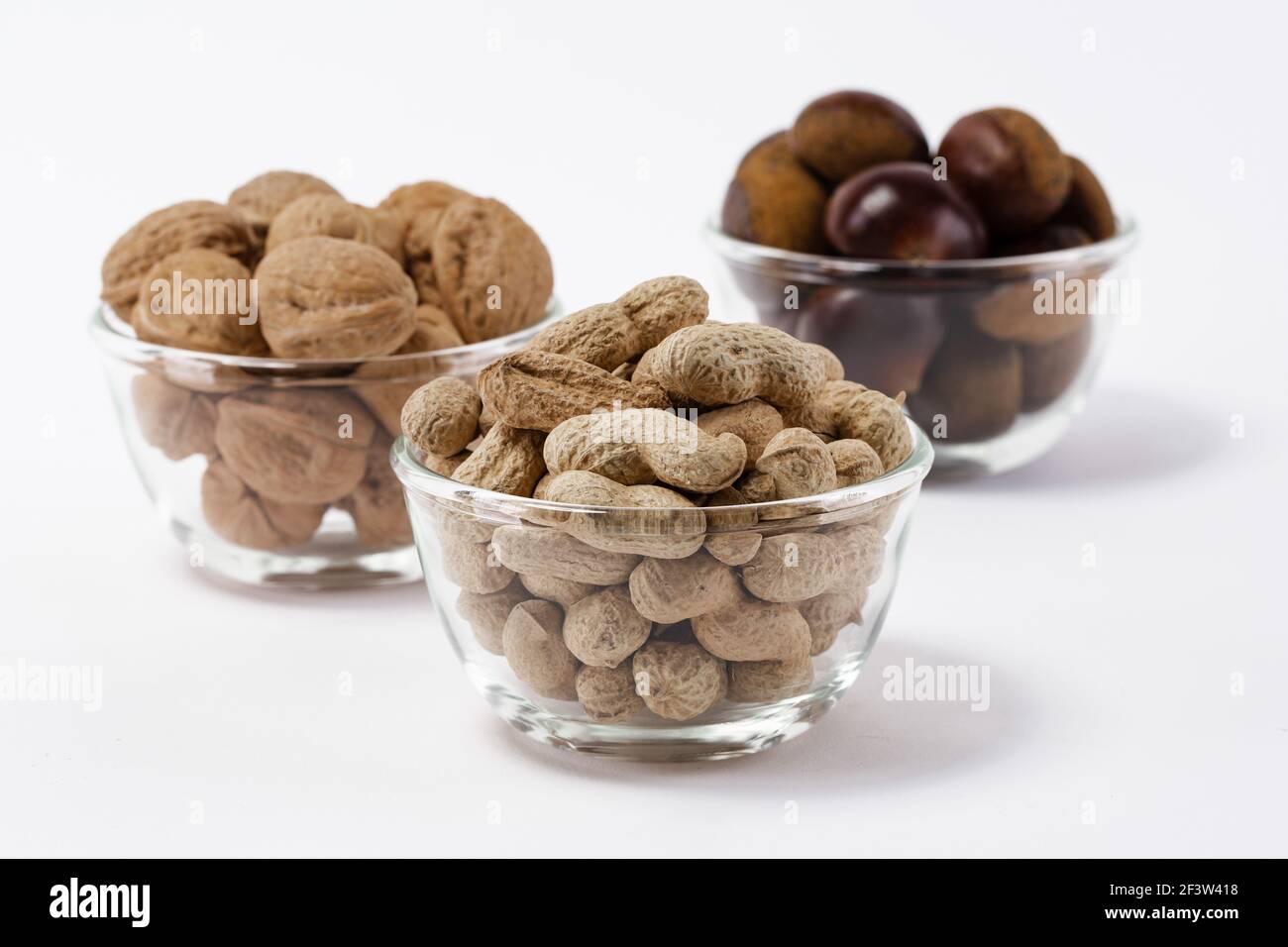 chestnuts, peanuts and walnuts Stock Photo - Alamy
