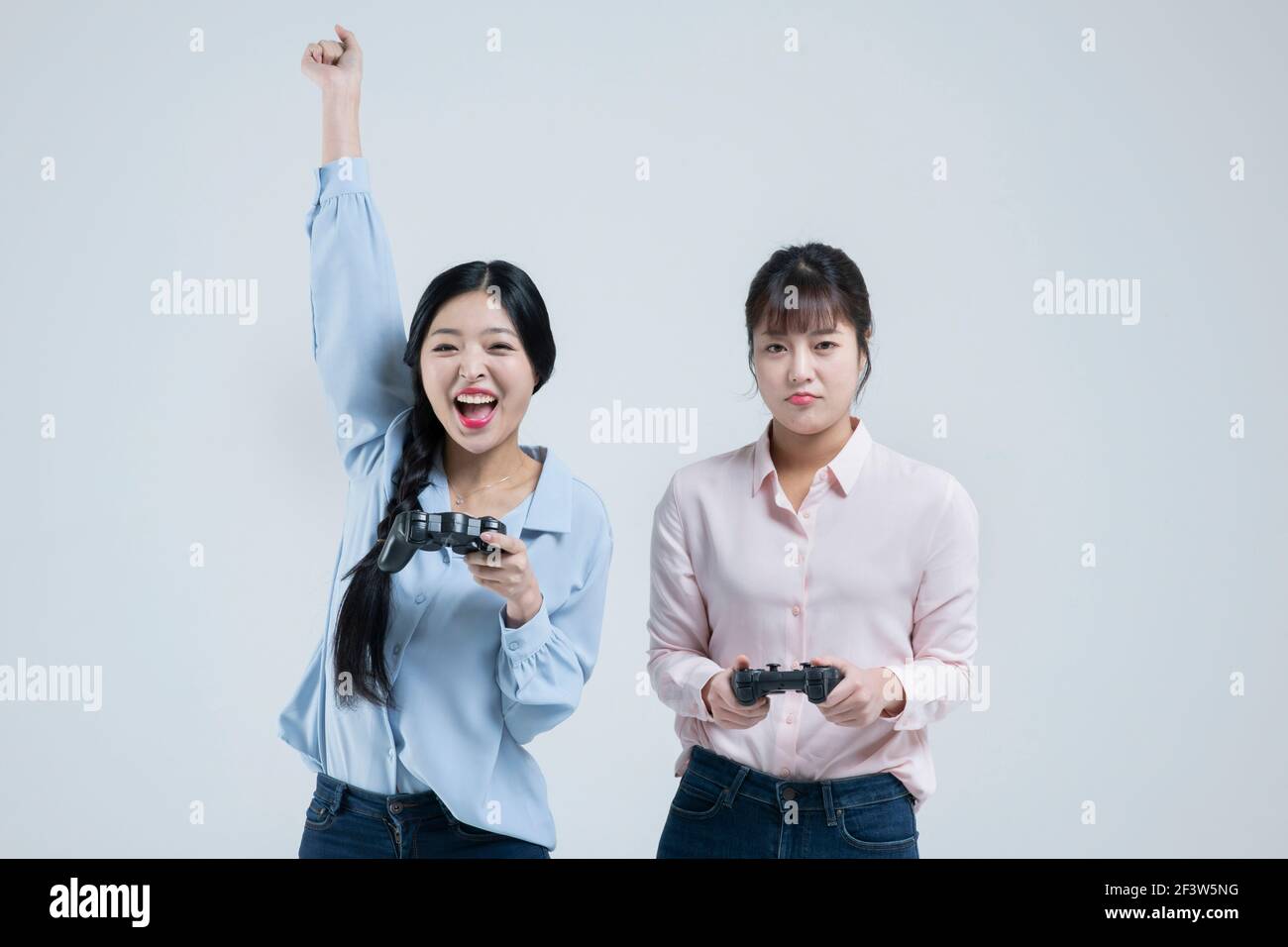Two controllers hi-res stock photography and images - Alamy
