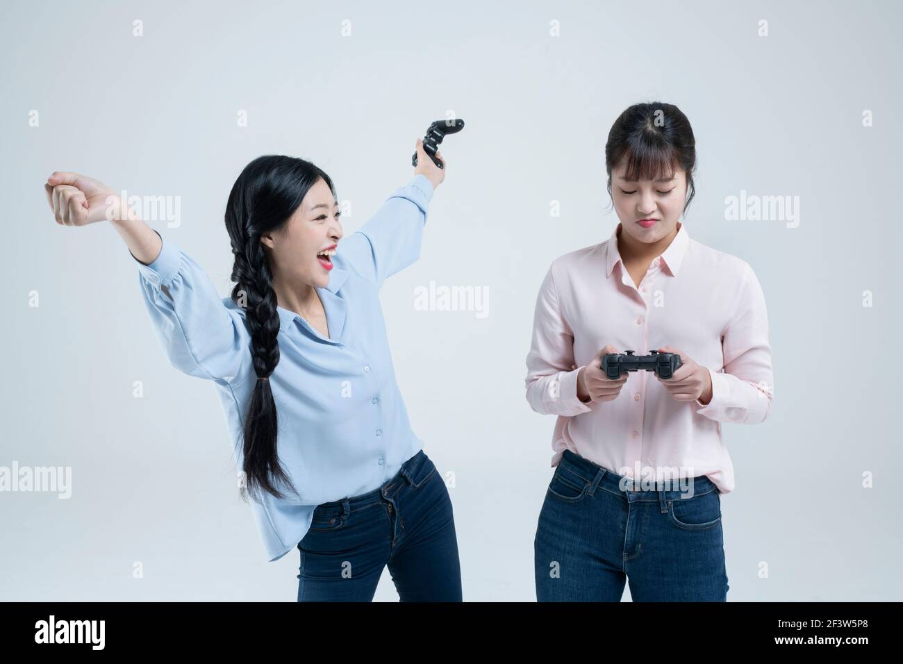 Game controllers hi-res stock photography and images - Alamy