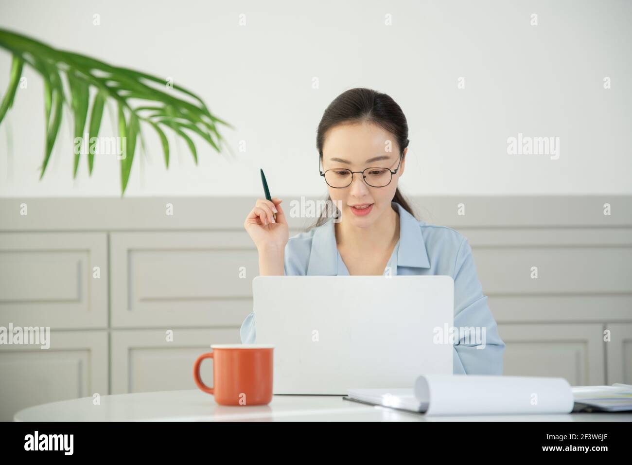 remote work, working at home concept of Asian woman in smart casual ...