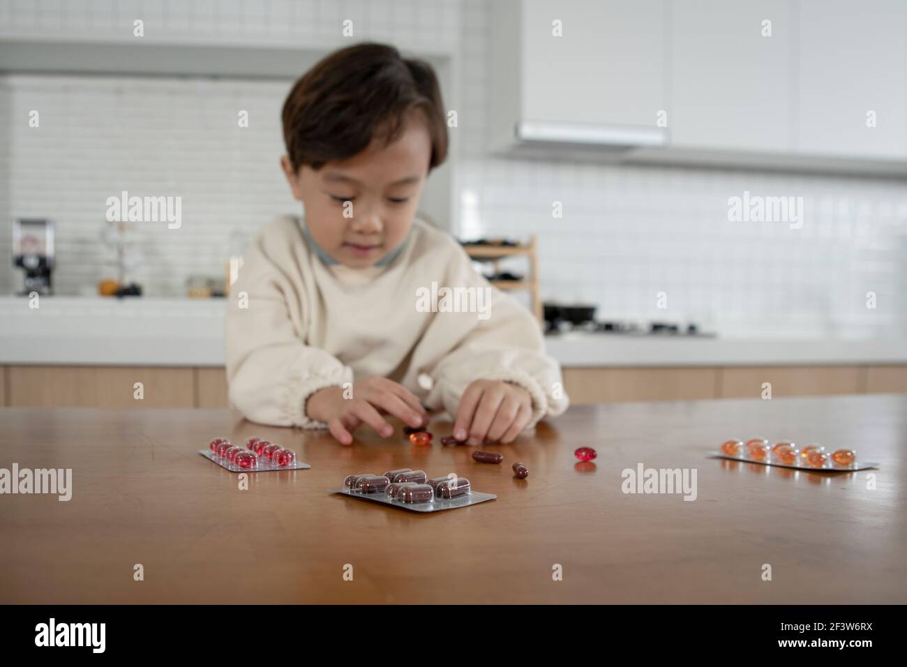 child abuse concept, Asian child with no food at home searching for ...