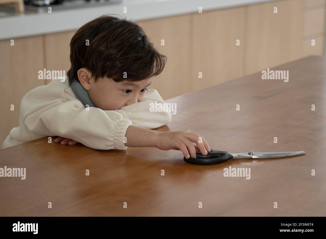 child abuse concept, Asian child with no food at home searching for ...