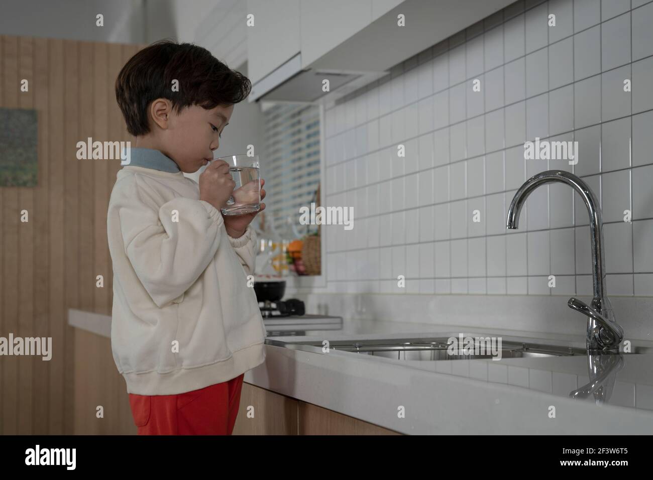 child abuse concept, Asian child with no food at home searching for ...