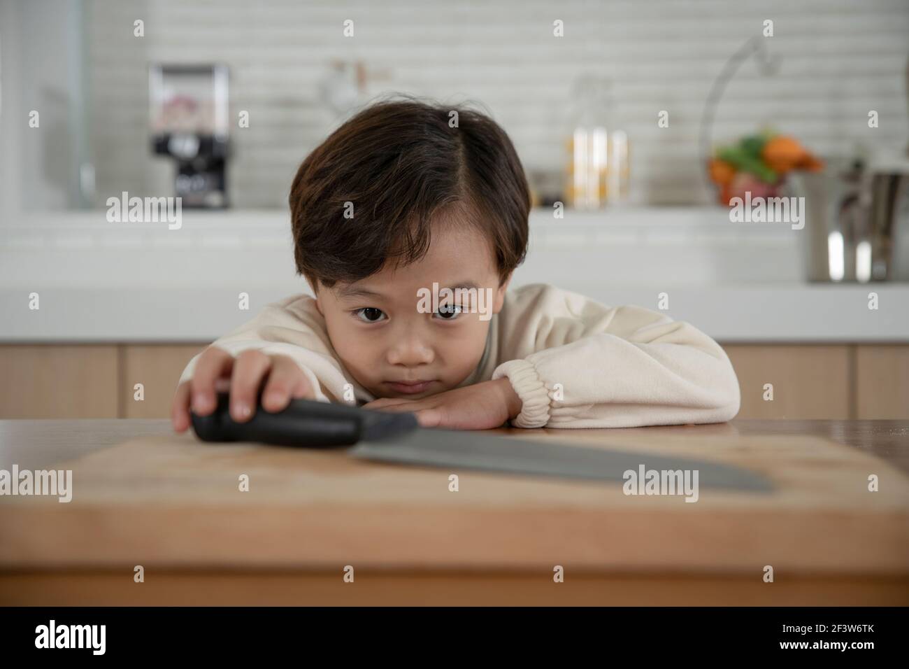 child abuse concept, Asian child with no food at home searching for ...