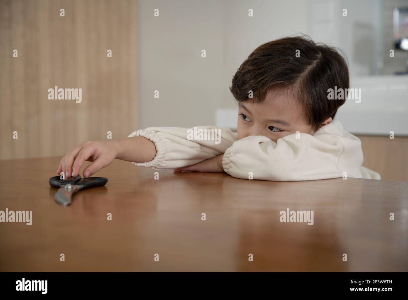 child abuse concept, Asian child with no food at home searching for ...