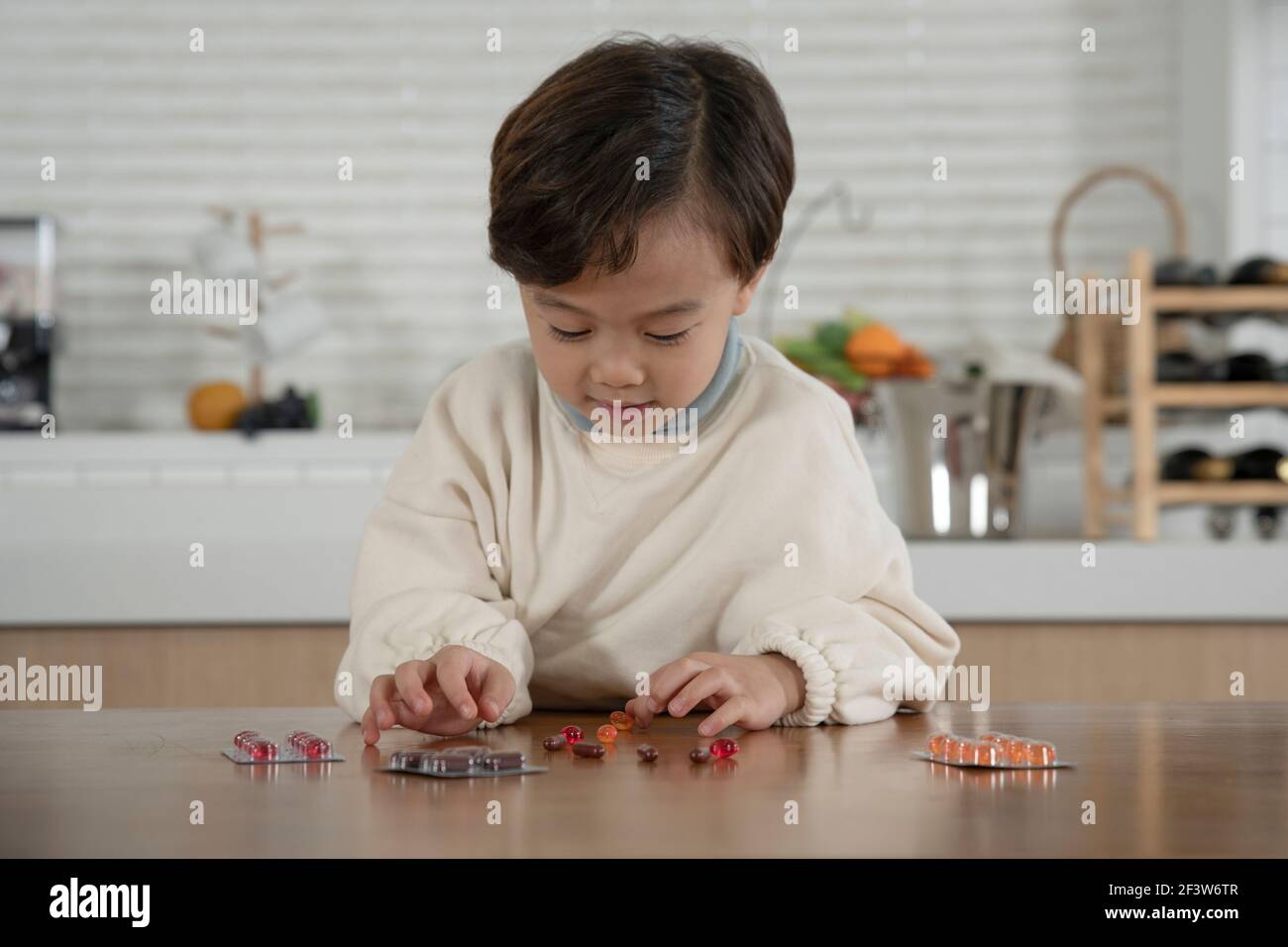 child abuse concept, Asian child with no food at home searching for ...