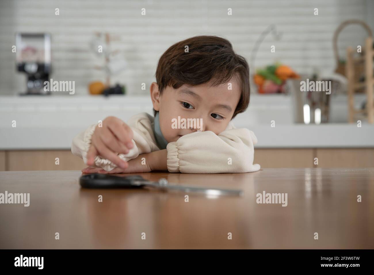 child abuse concept, Asian child with no food at home searching for ...