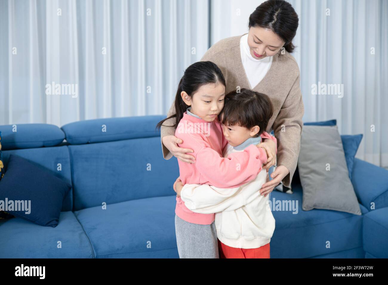 Hugging after fight hi-res stock photography and images - Alamy