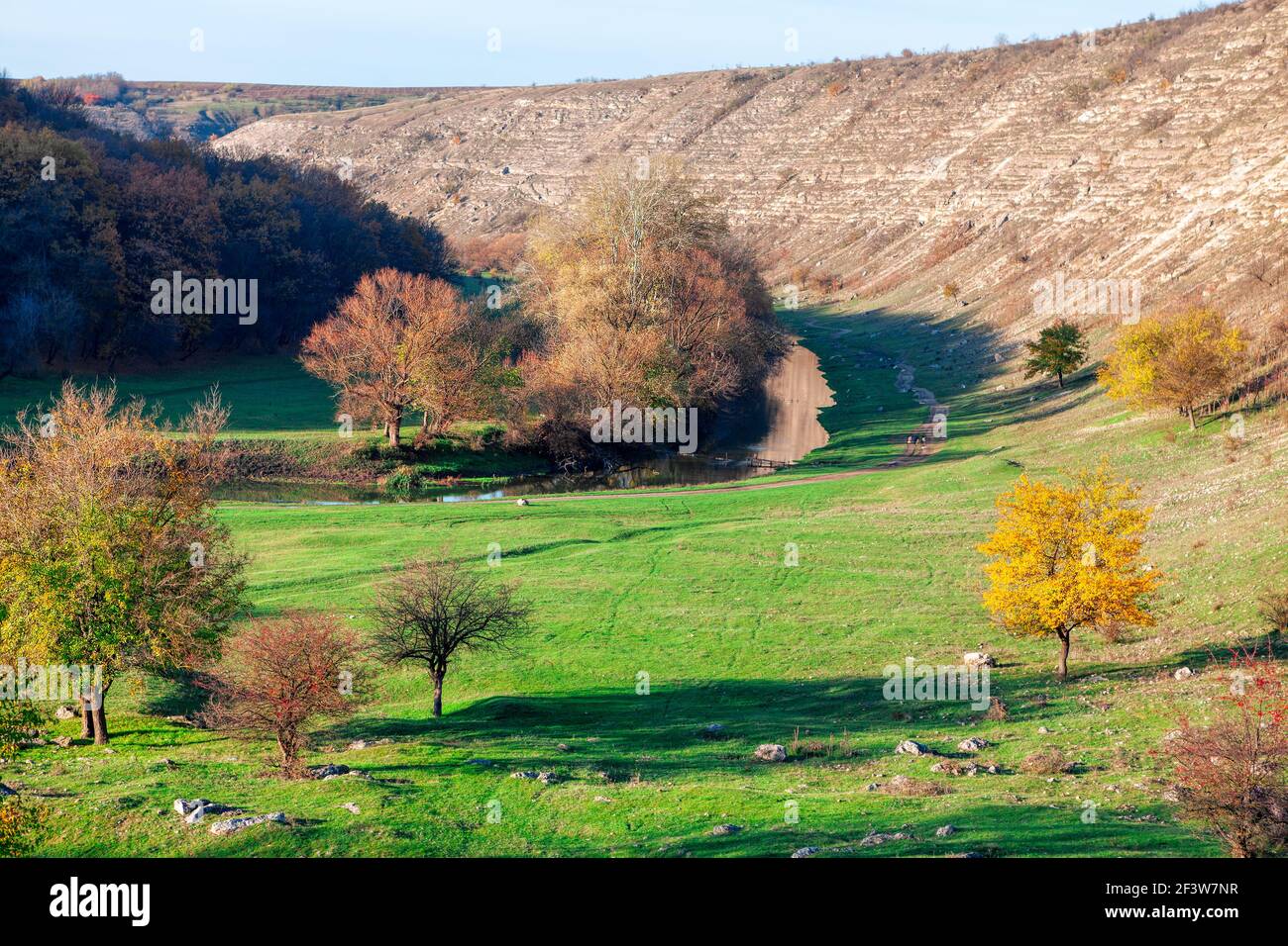 Riverside valley with hills . Nature scenery with river Raut in Furceni ...