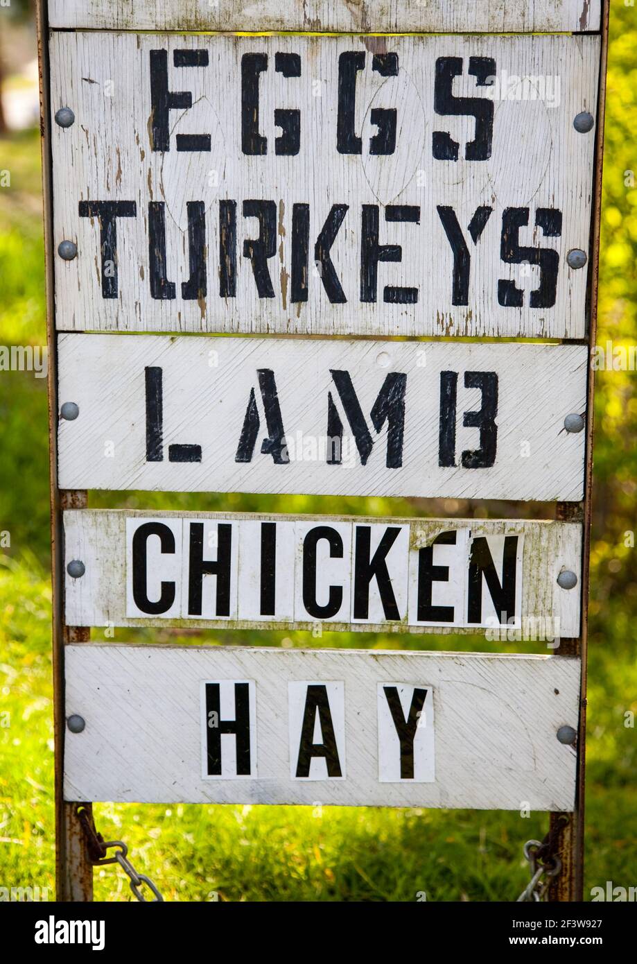 local farm sign selling produce Stock Photo - Alamy