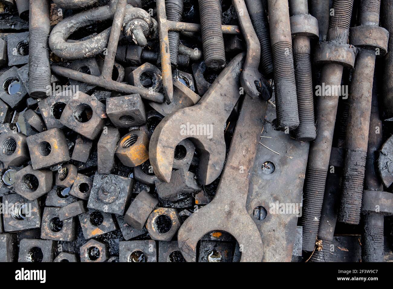 collection of old rusty nuts and bolts Stock Photo - Alamy