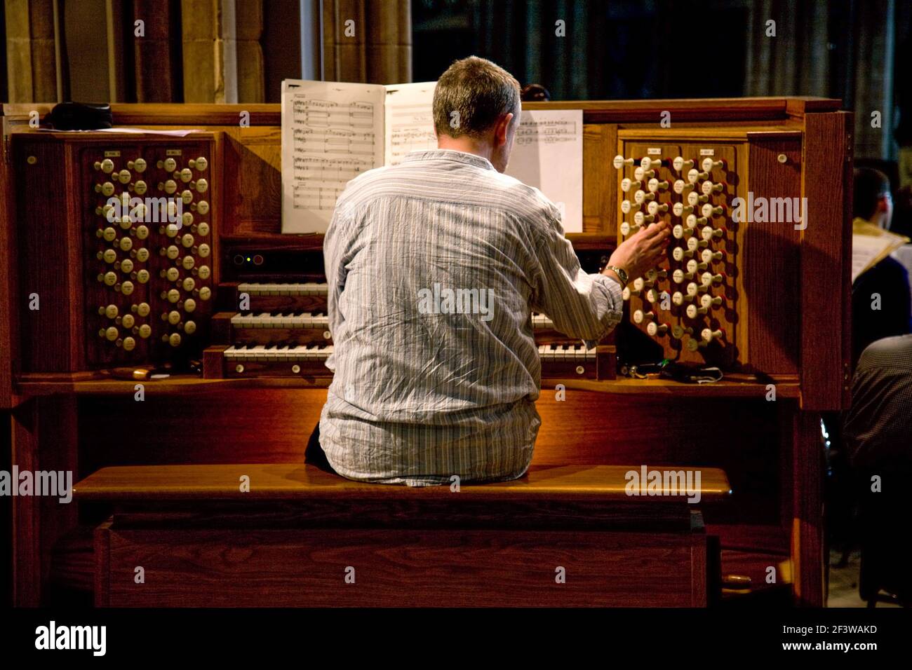 man playing organ at church concert Stock Photo - Alamy