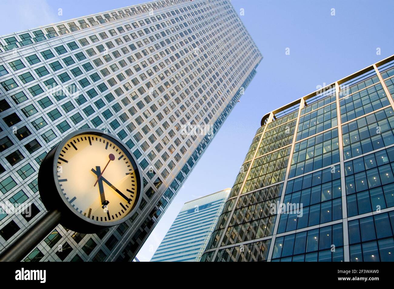 clock and skyscrapers at Canary Wharf, London, UK Stock Photo - Alamy