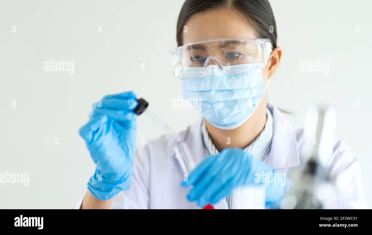 Forensic scientist analysing dna hi-res stock photography and images ...