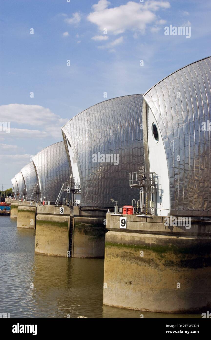 The Thames Flood Barrier viewed from the banks of the river at ...
