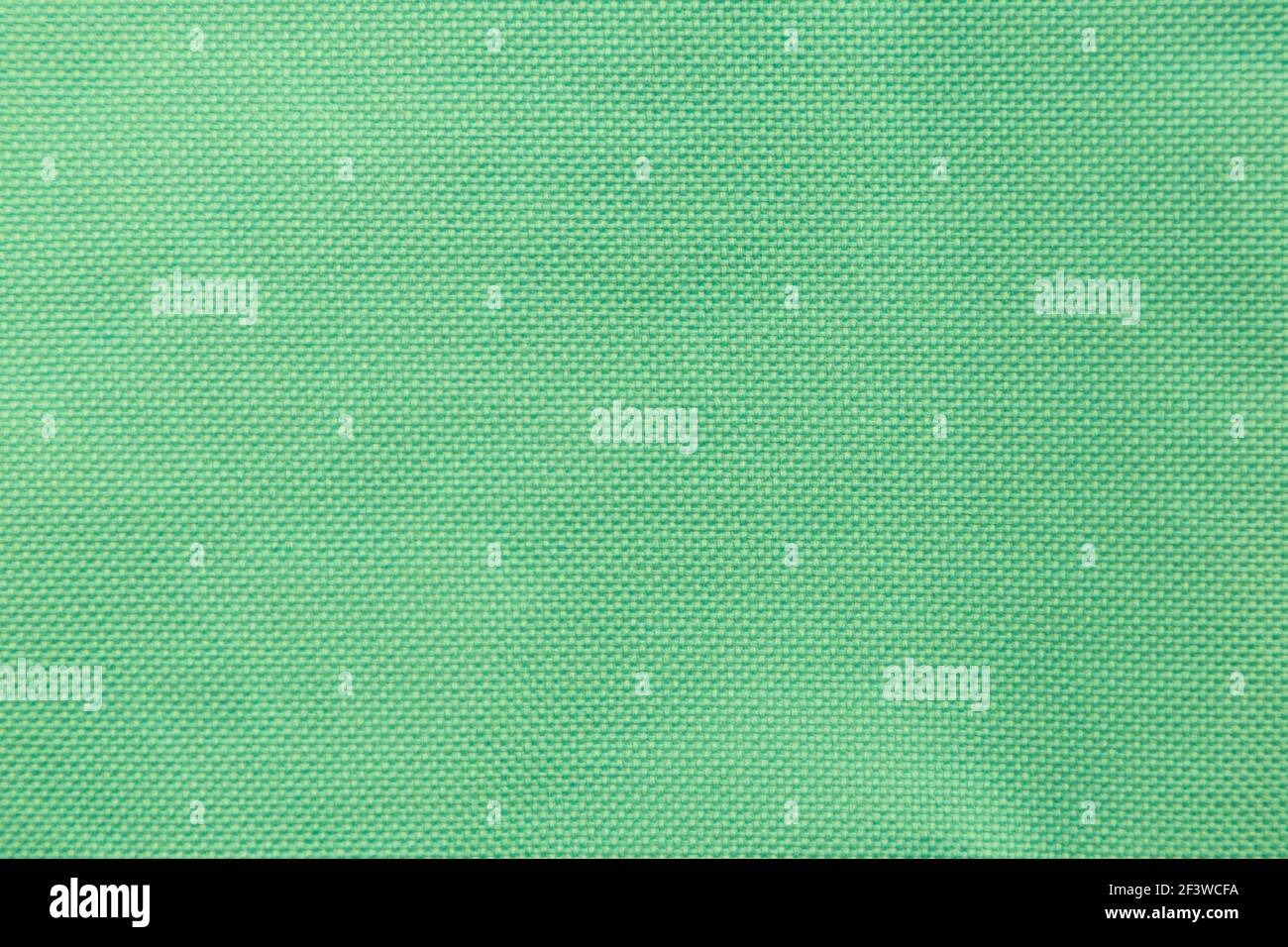 Green fabric cloth background texture for design Stock Photo - Alamy