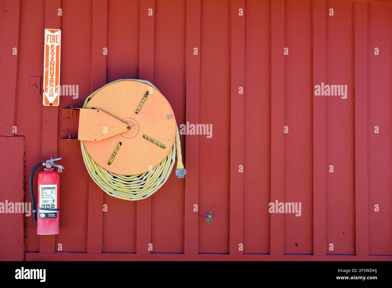 Fire hose wall hi-res stock photography and images - Alamy