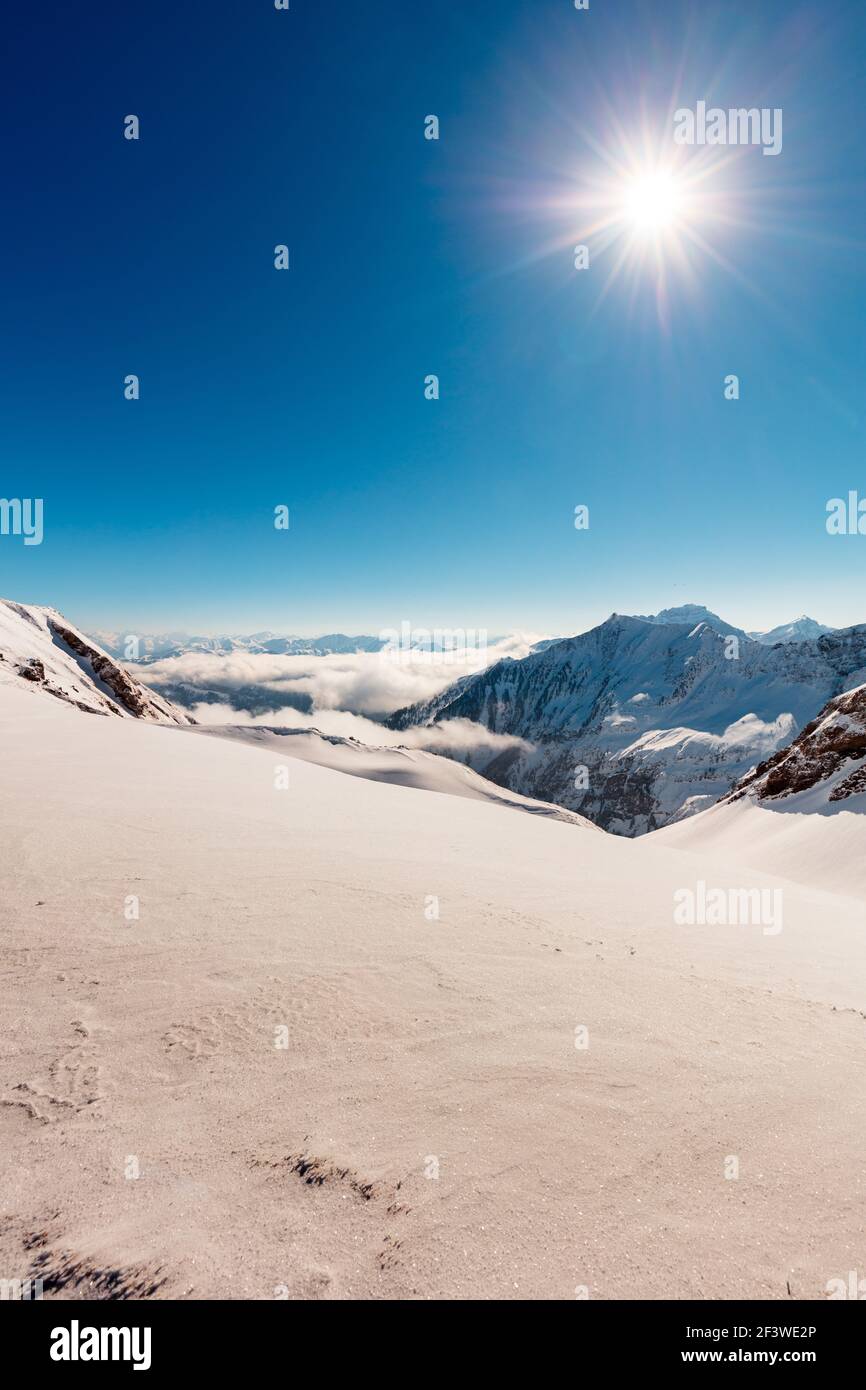 Wonderful view of the snow-capped Swiss Alps and blue sky from the ...