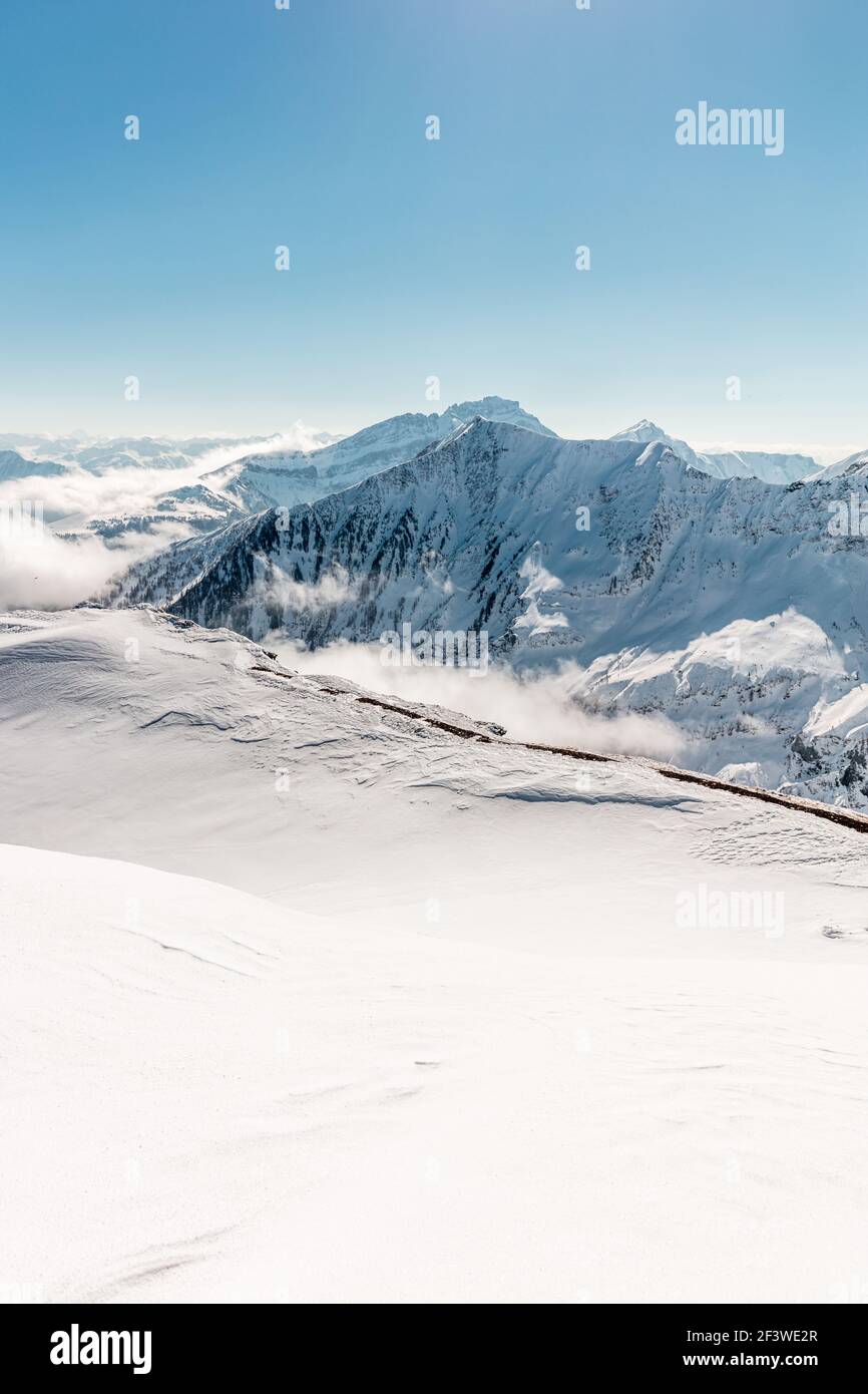 Wonderful view of the snow-capped Swiss Alps and blue sky from the ...