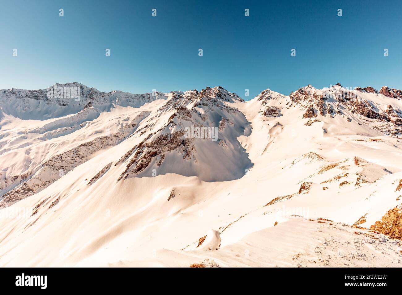 Wonderful view of the snow-capped Swiss Alps and blue sky from the ...