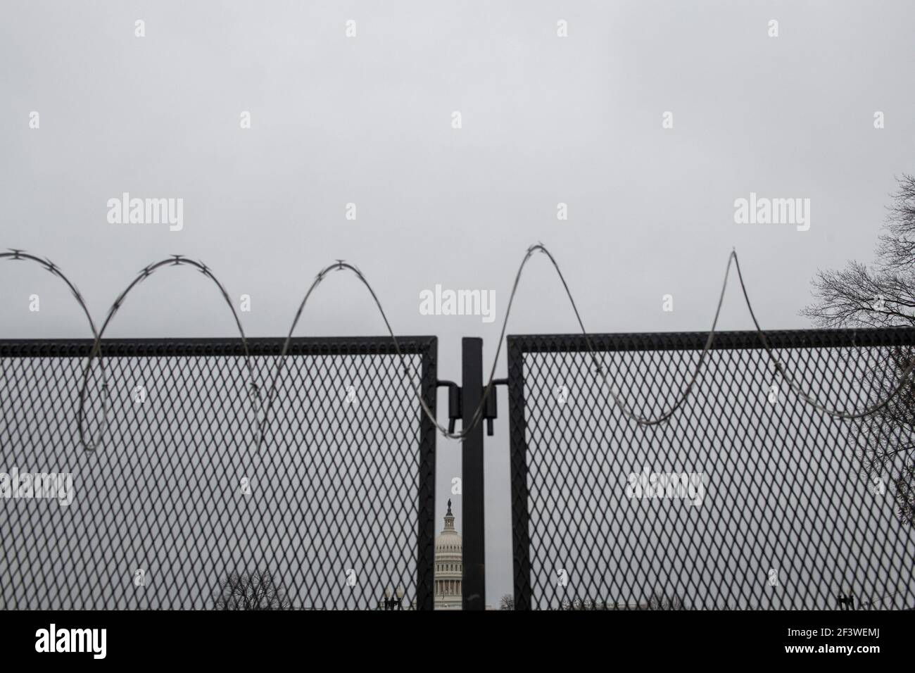 The iron, barbed wire-topped barrier fence still surrounds the U.S ...