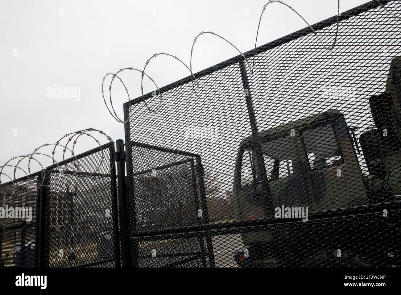 The iron, barbed wire-topped barrier fence still surrounds the U.S ...