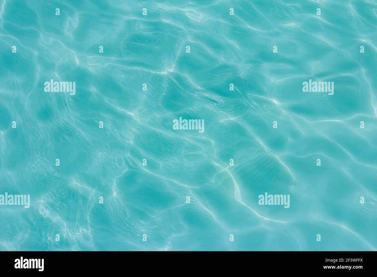 swimming pool with sunny reflections background Stock Photo - Alamy