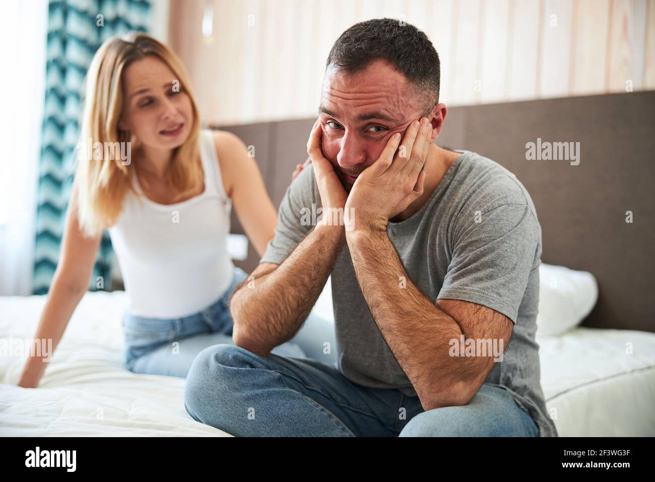 Married young couple having argument at home Stock Photo - Alamy