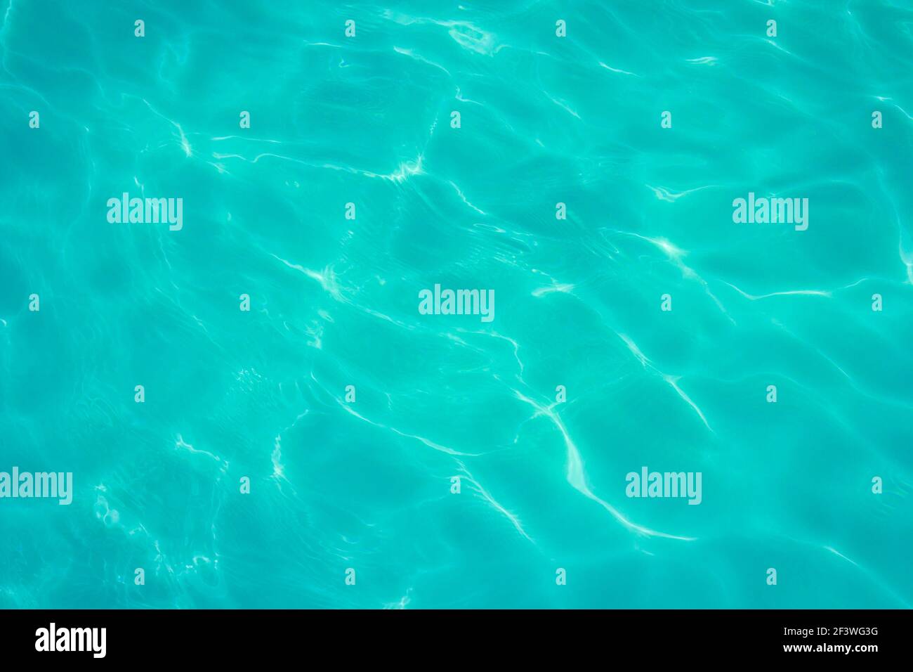 swimming pool with sunny reflections background Stock Photo - Alamy