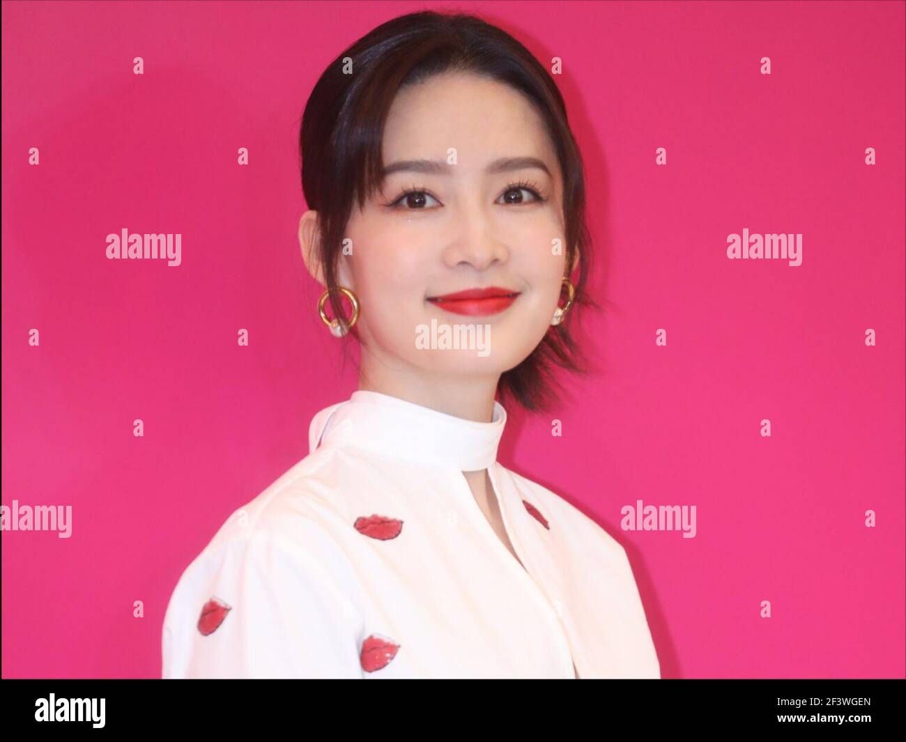 Chinese actress Li Qin, stands for a Valentino event in Shanghai, China ...